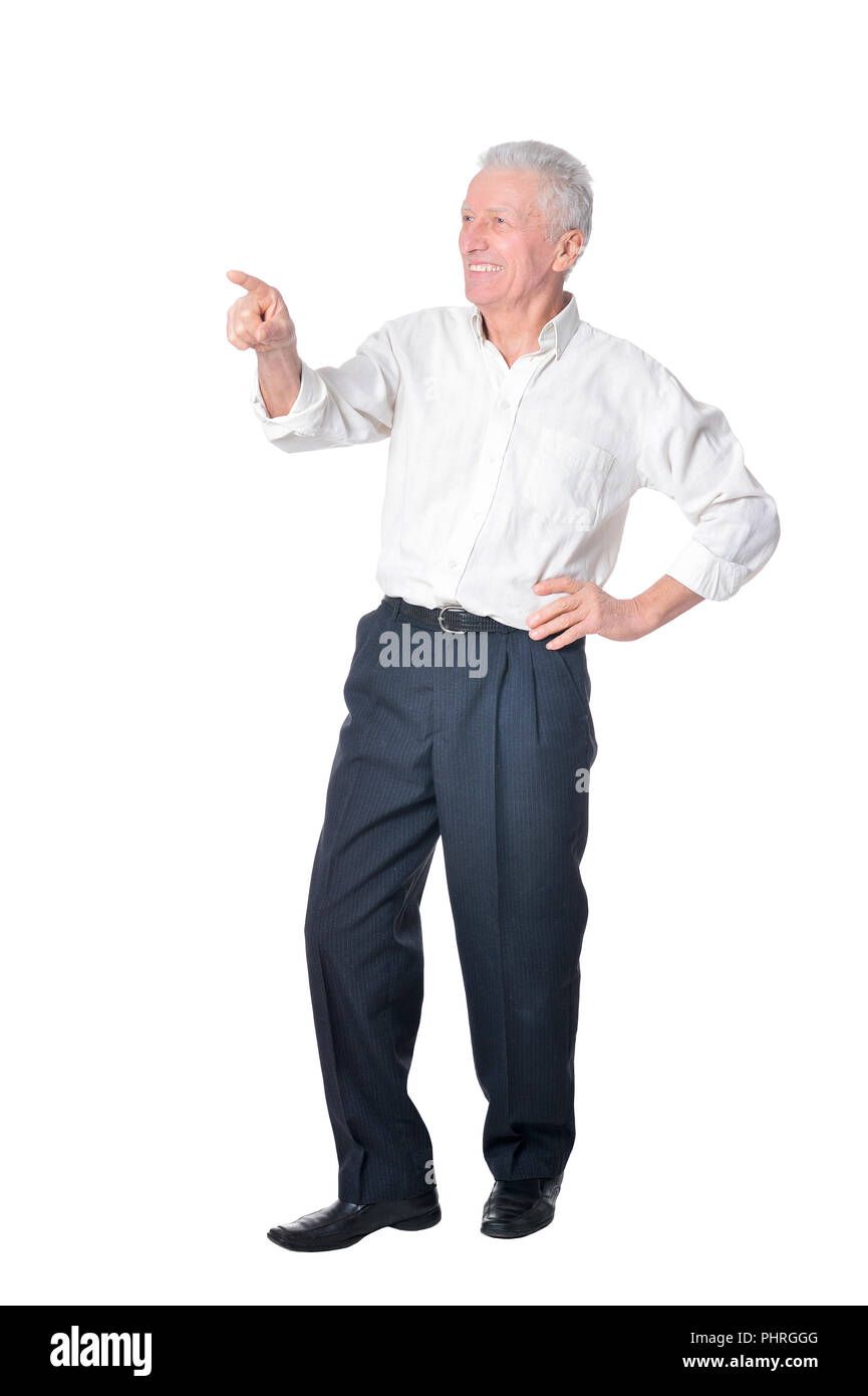 Portrait of a senior man pointing isolated Stock Photo - Alamy