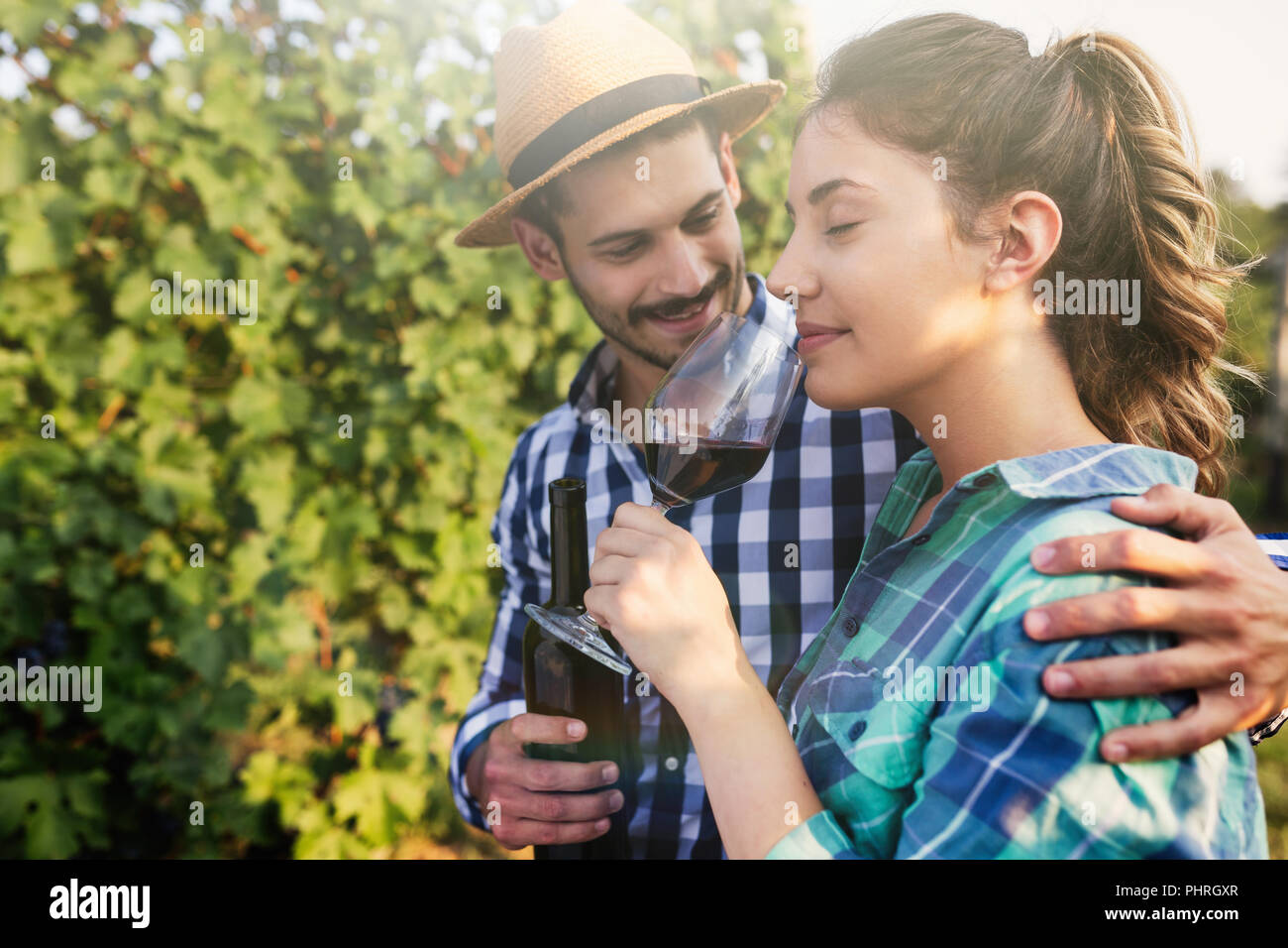 People tasting wine in vineyard Stock Photo - Alamy