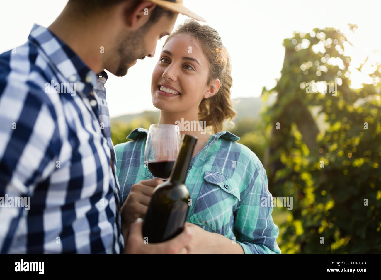 People sampling and tasting wines in vineyard Stock Photo - Alamy