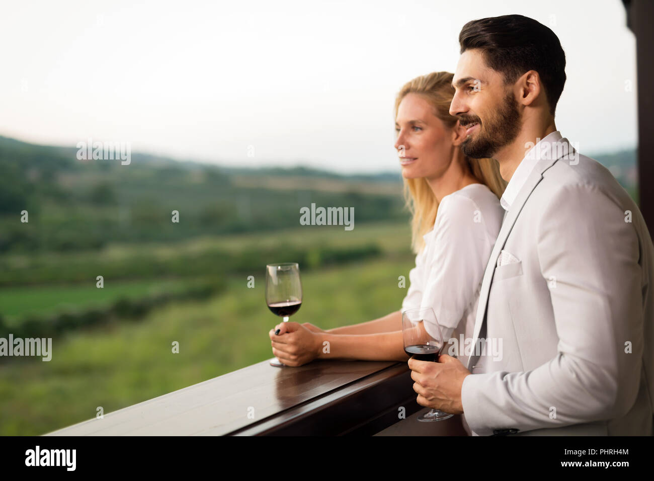 People tasting wine in vineyard Stock Photo - Alamy