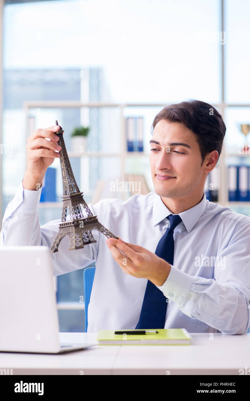 Sales agent working in travel agency Stock Photo - Alamy