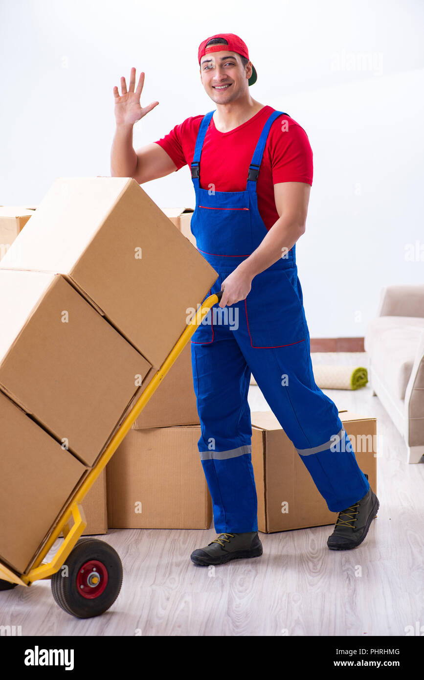 Contractor worker moving boxes during office move Stock Photo - Alamy