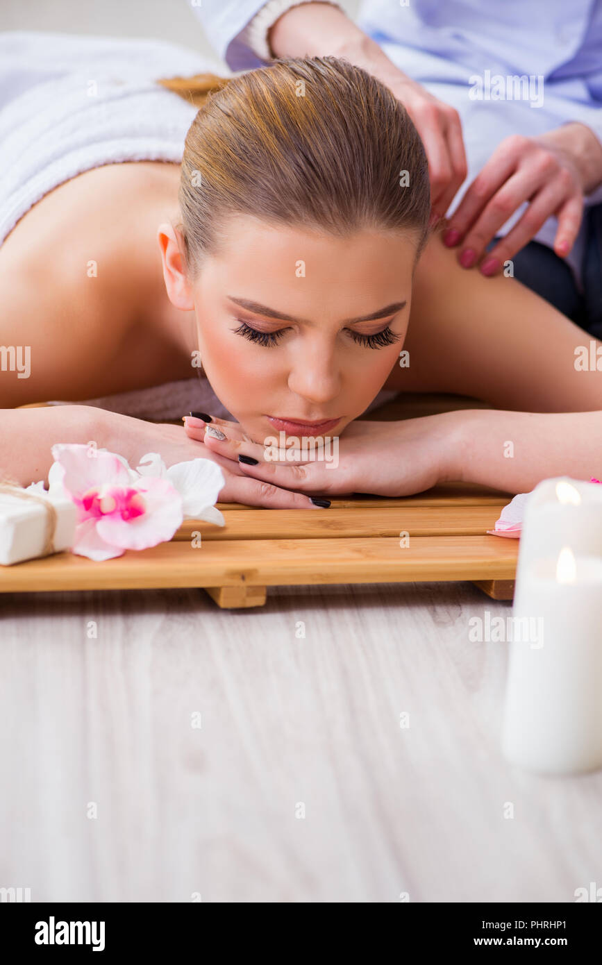 Young woman during spa procedure in salon Stock Photo - Alamy