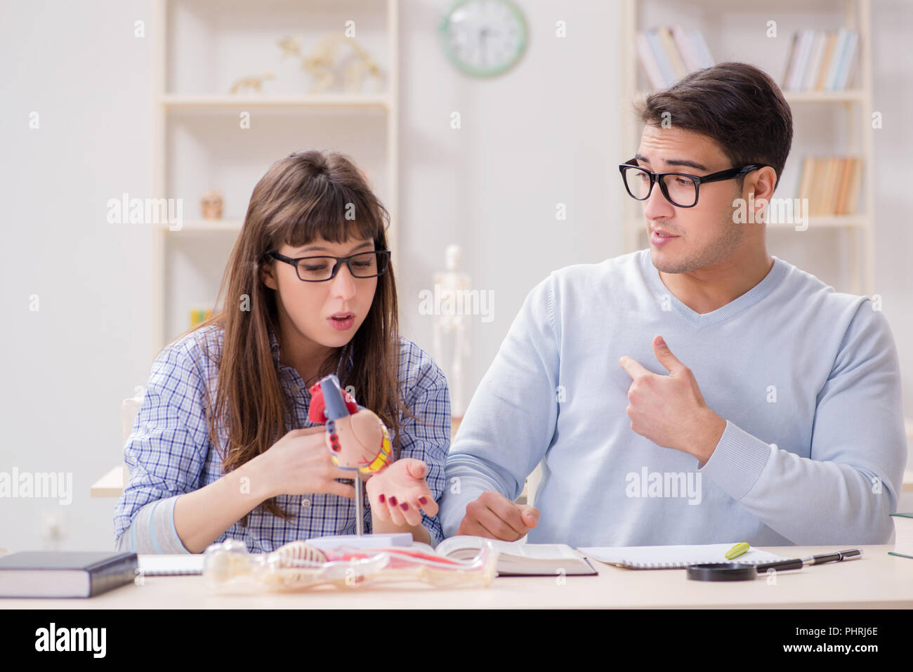 Two medical students studying in classroom Stock Photo - Alamy