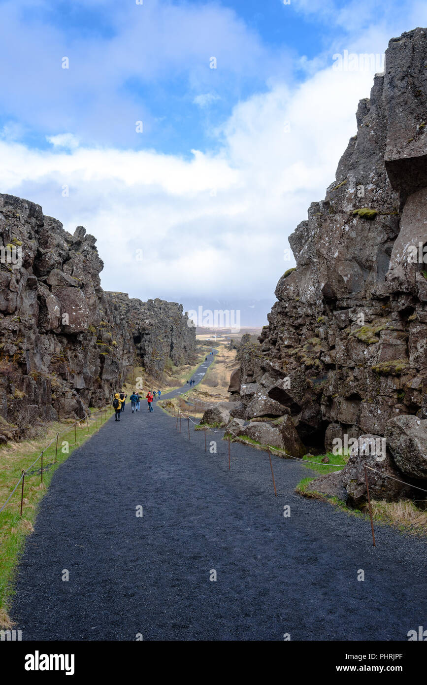 The walking path through the rift zone in Thingvellir National Park ...