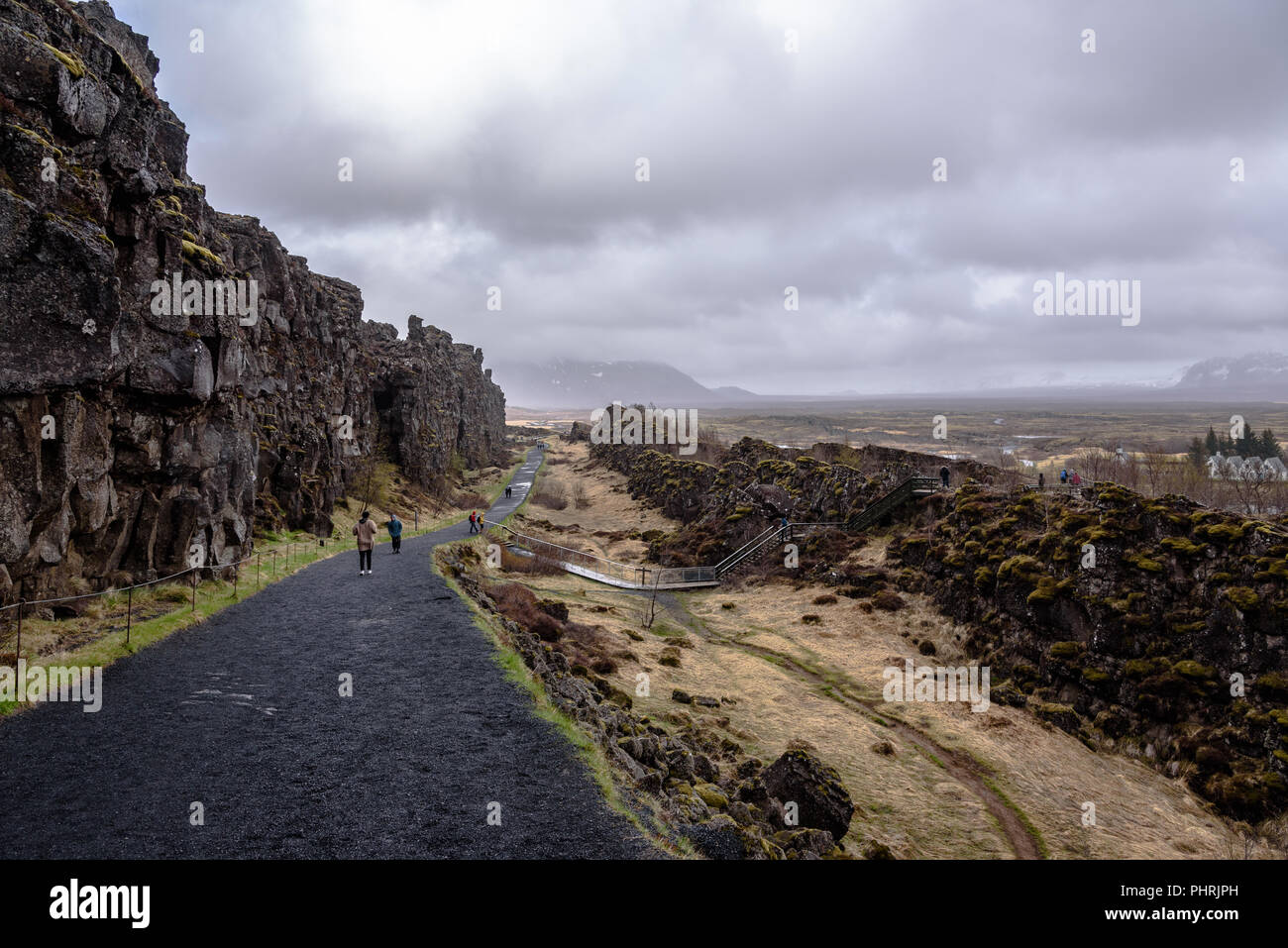 The walking path through the rift zone in Thingvellir National Park ...