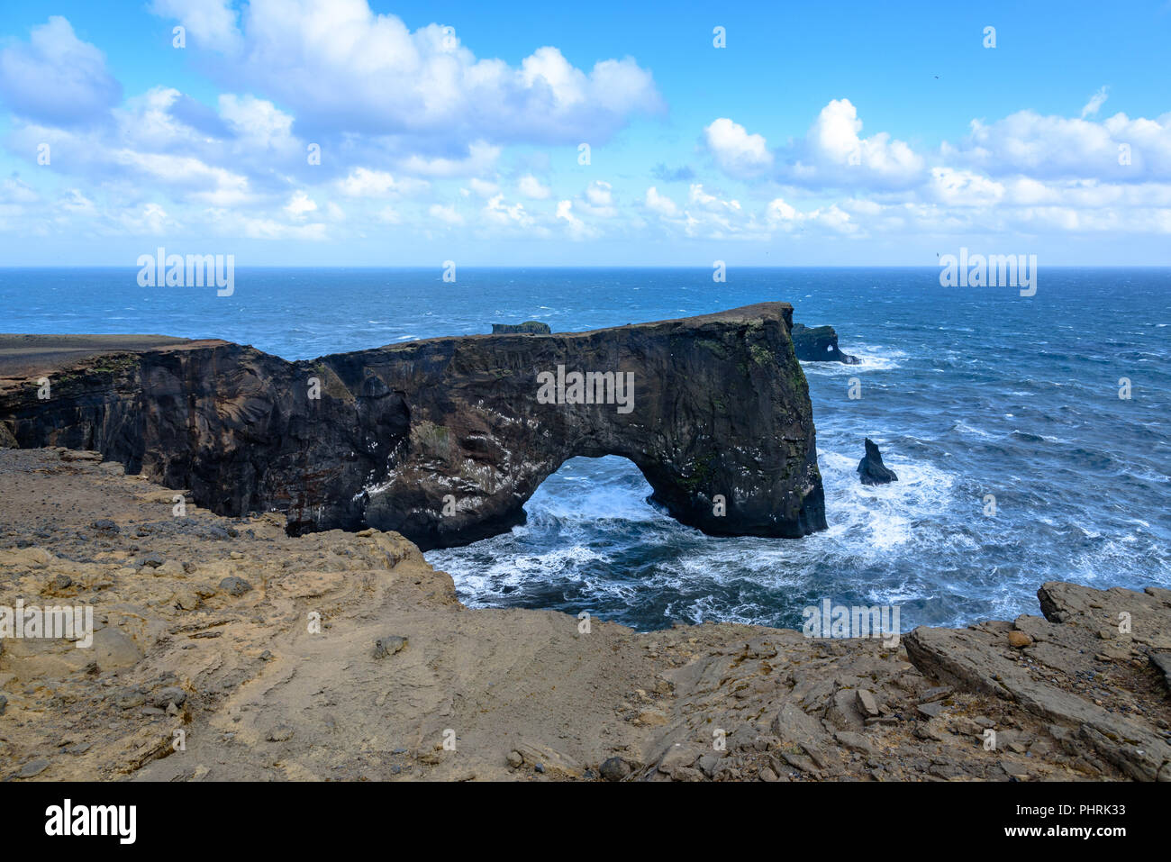 The Dyrholaey arch on the Icelandic coast Stock Photo - Alamy