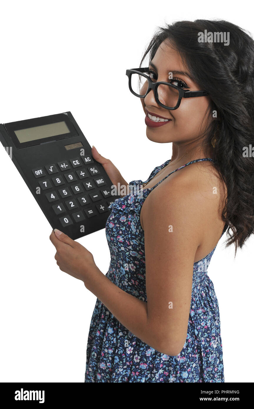 Woman using oversized calculator Stock Photo - Alamy