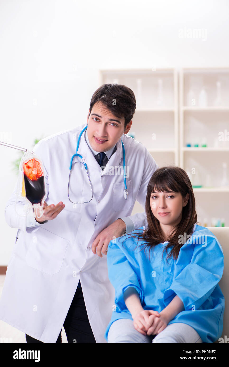 Doctor discussing blood transfusion with patient Stock Photo - Alamy