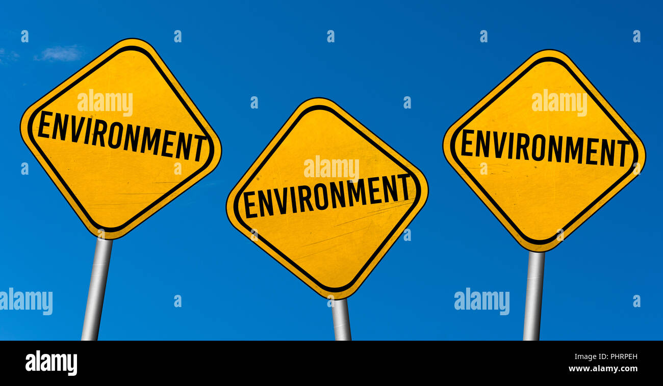 environment - yellow signs with blue sky Stock Photo - Alamy