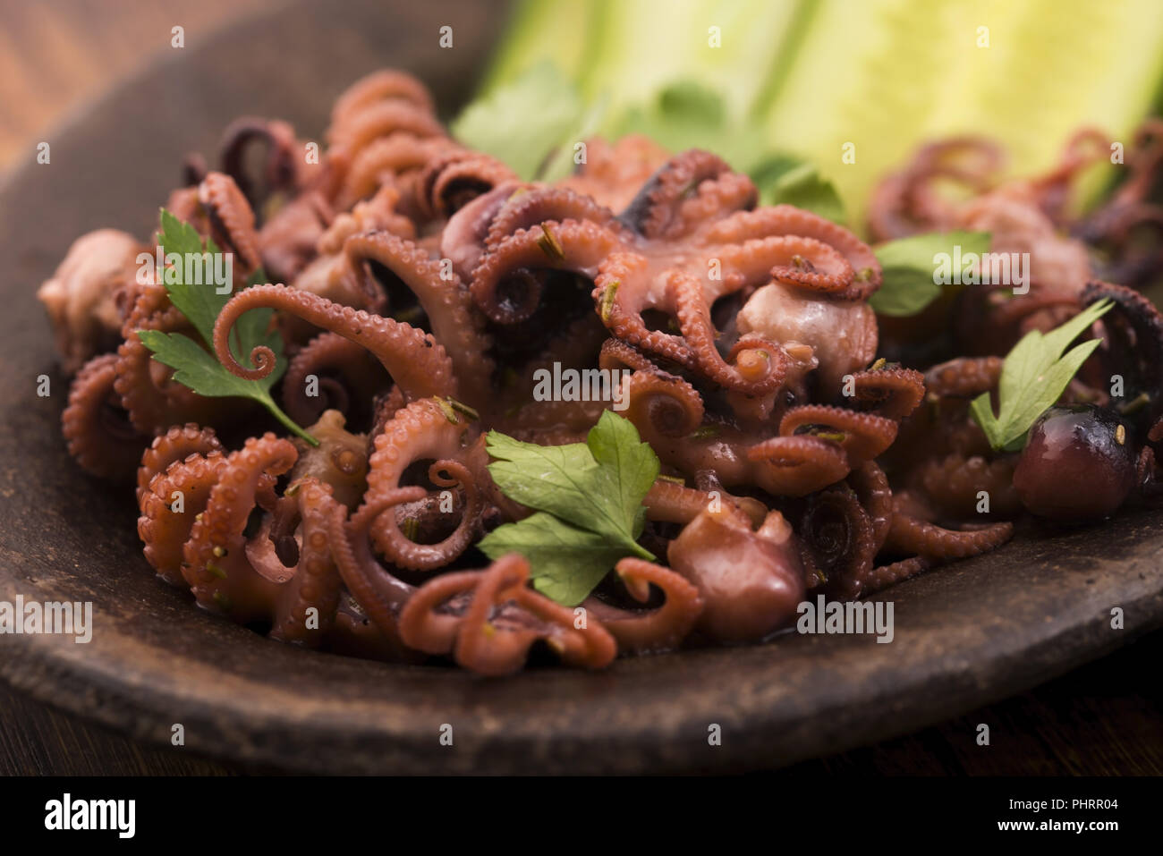 Octopus. Greek, eating Stock Photo - Alamy