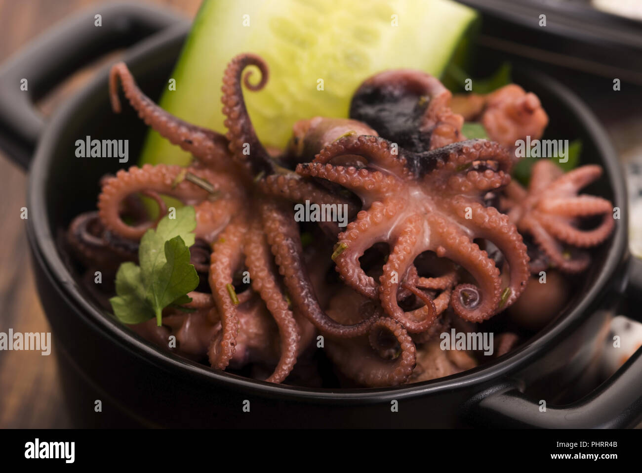 Octopus. Greek, eating Stock Photo - Alamy