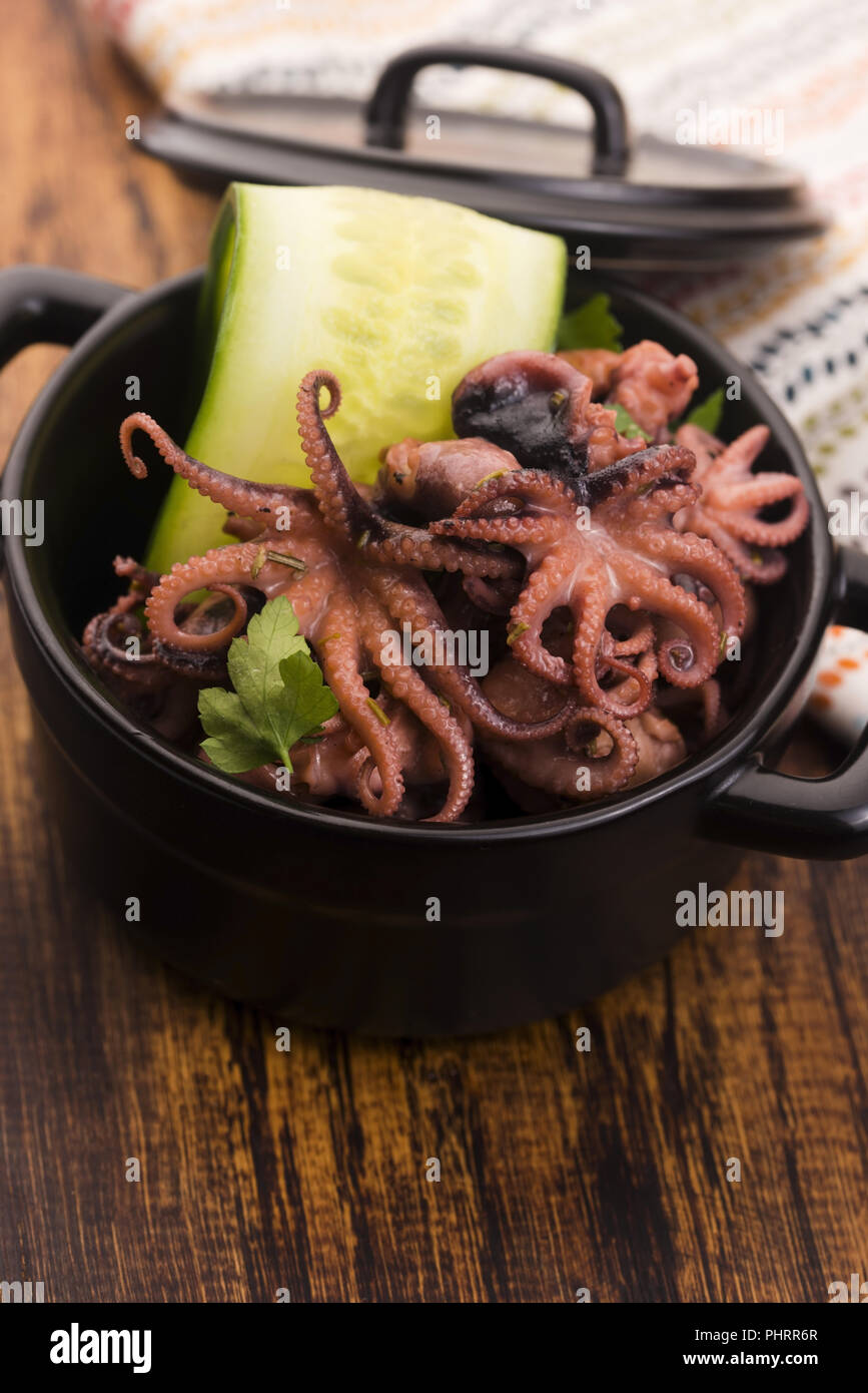Octopus. Greek, eating Stock Photo - Alamy