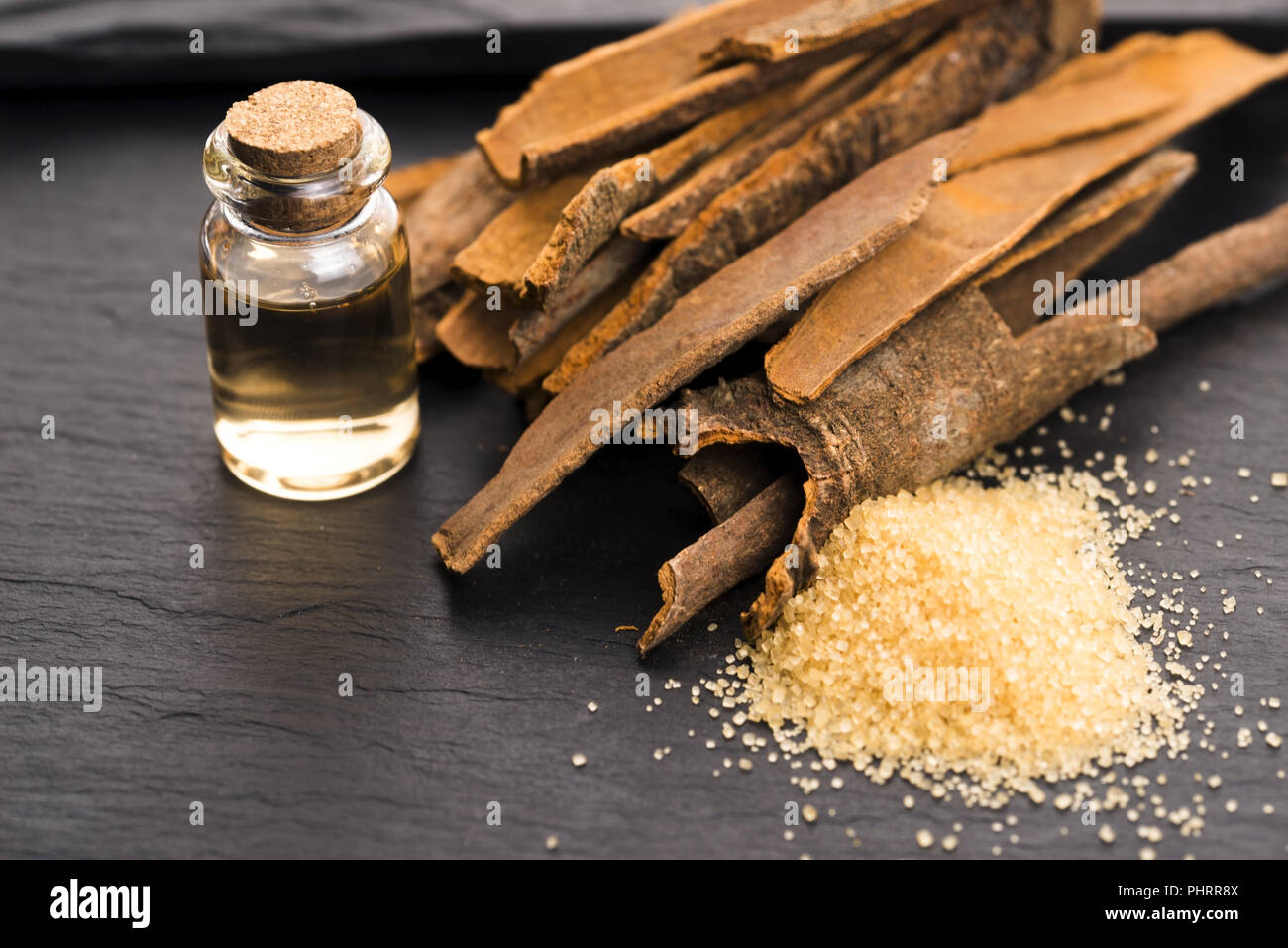 Cinnamon essential oil Stock Photo - Alamy