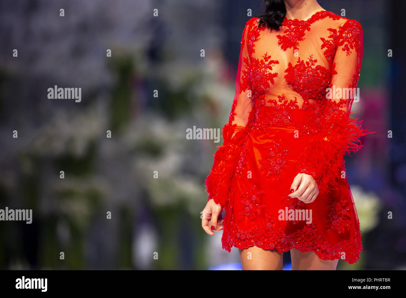 Fashion catwalk runway show model red dress Stock Photo - Alamy