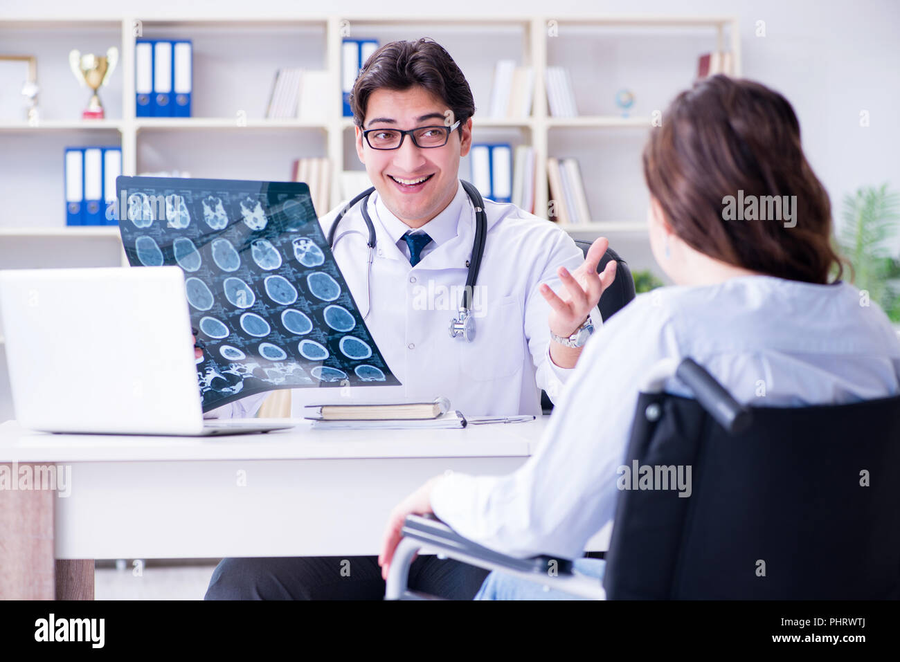 Doctor explaining xray results patient hi-res stock photography and ...