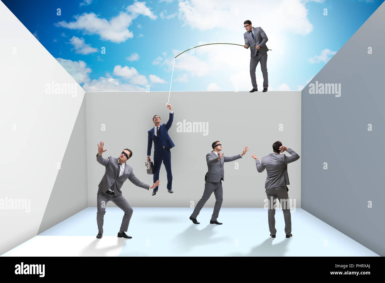 Businessman fishing his colleague in business concept Stock Photo - Alamy