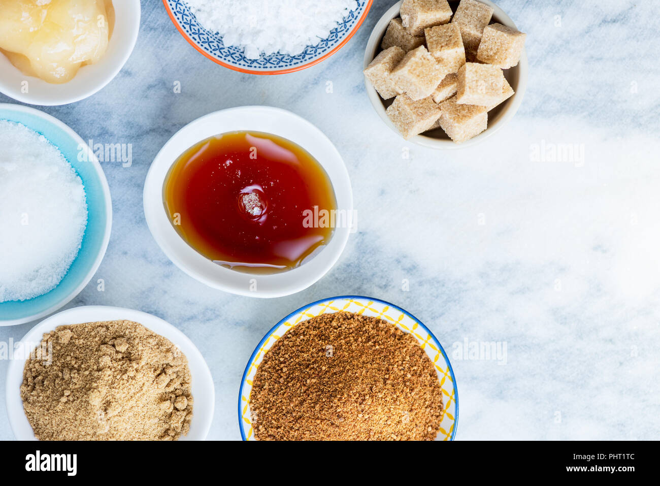Different Kinds of Sugar and Sweeteners in the Bowls, such as coconut ...