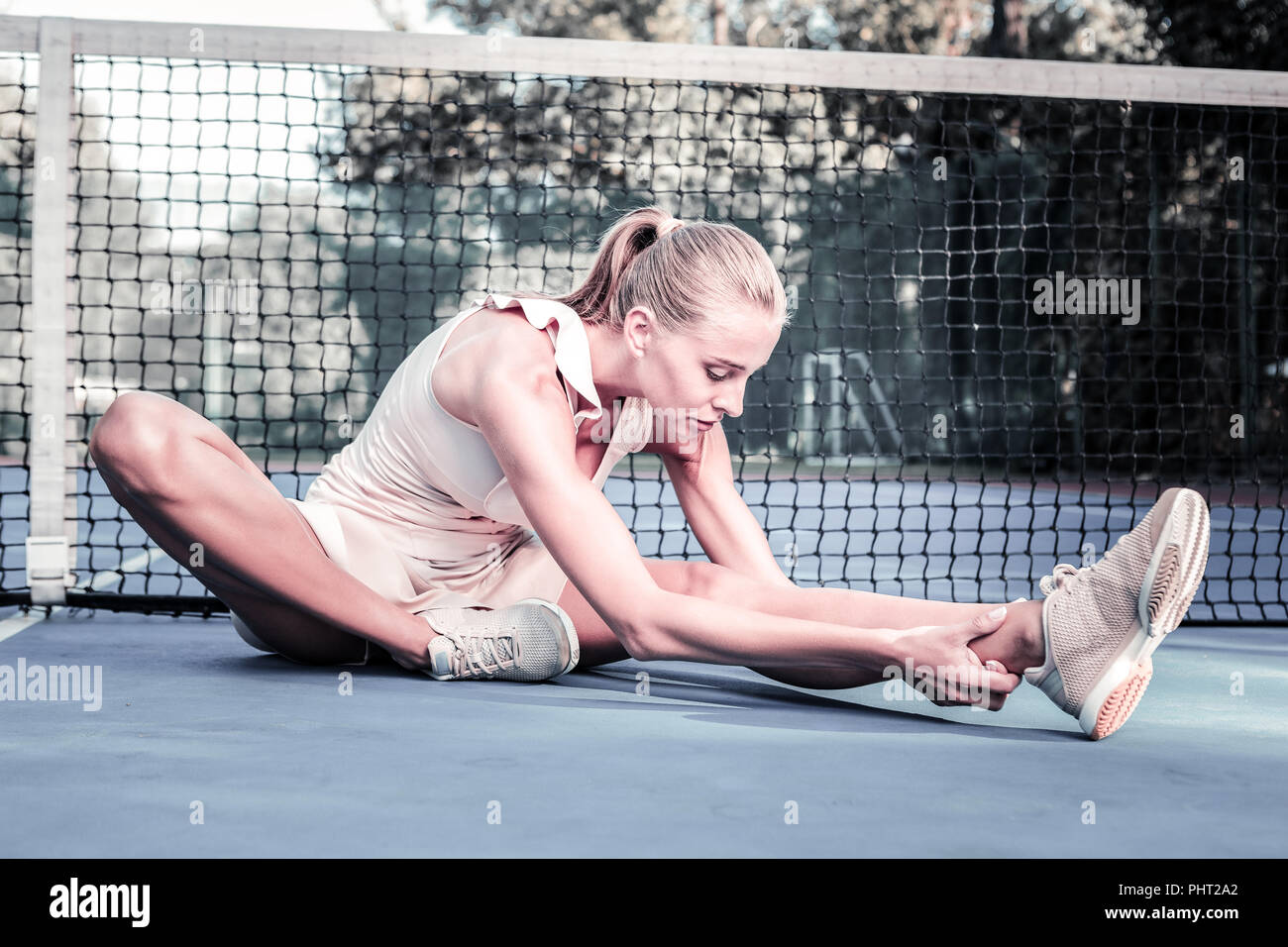 Calm successful female player avoiding sport traumas Stock Photo - Alamy