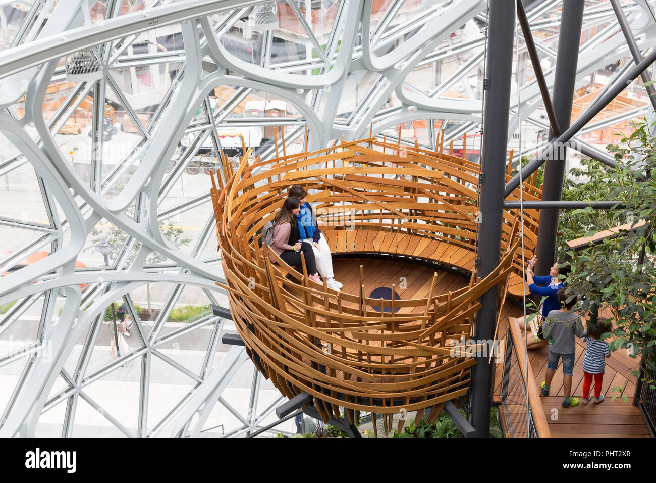 Seattle, Washington: Visitors take photos in the "birds nest" in the ...