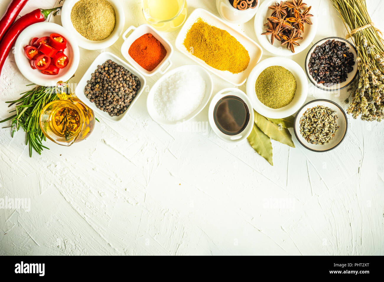 Organic food concept with different spices and herbs on rustic ...