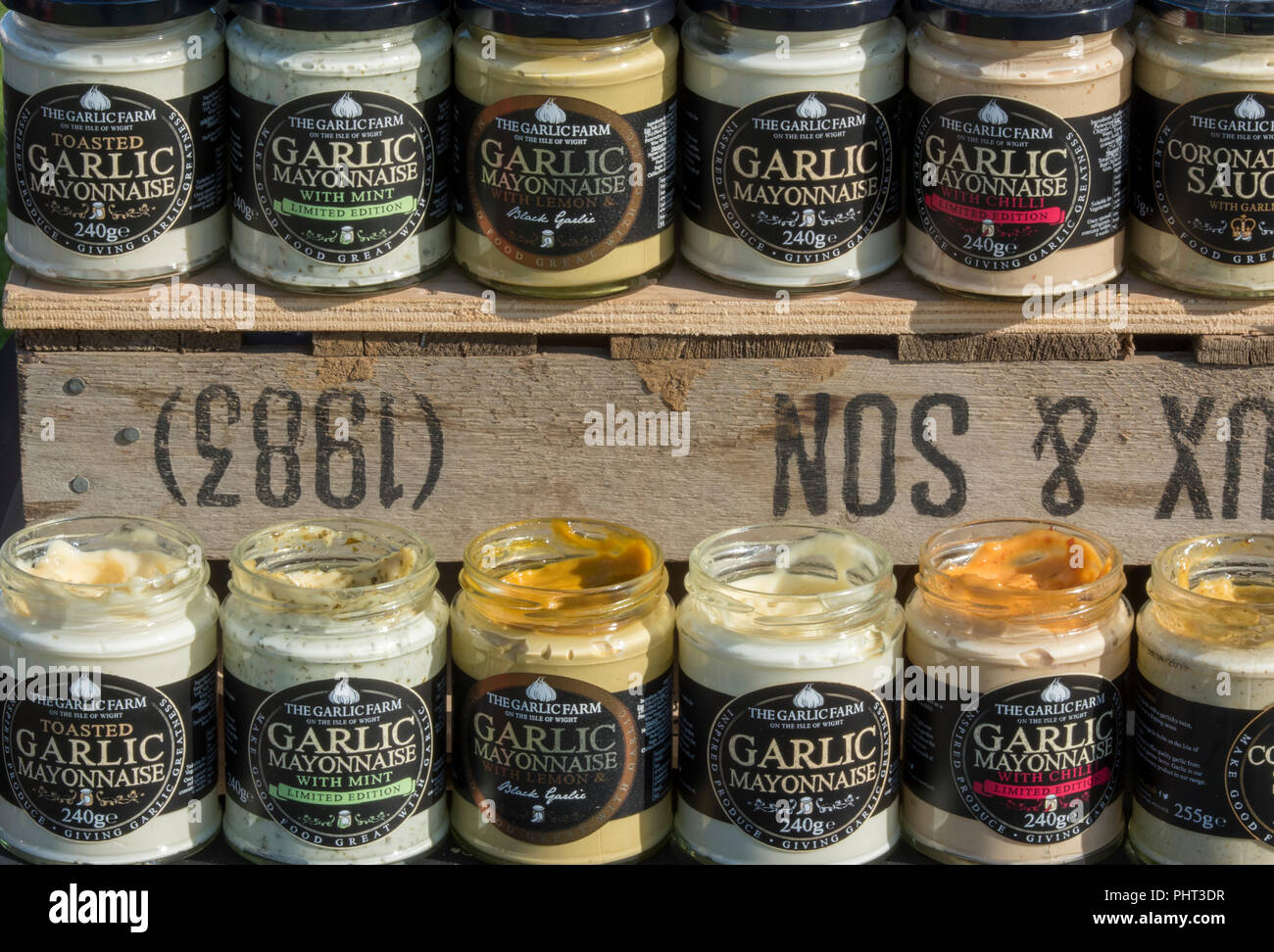 a selection of garlic flavoured sauces, chutneys and spreads on sale at ...