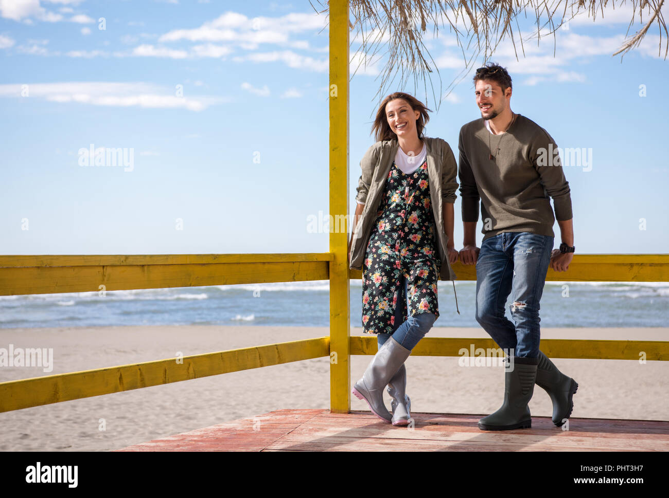 Couple spinning around on beach hi-res stock photography and images - Alamy