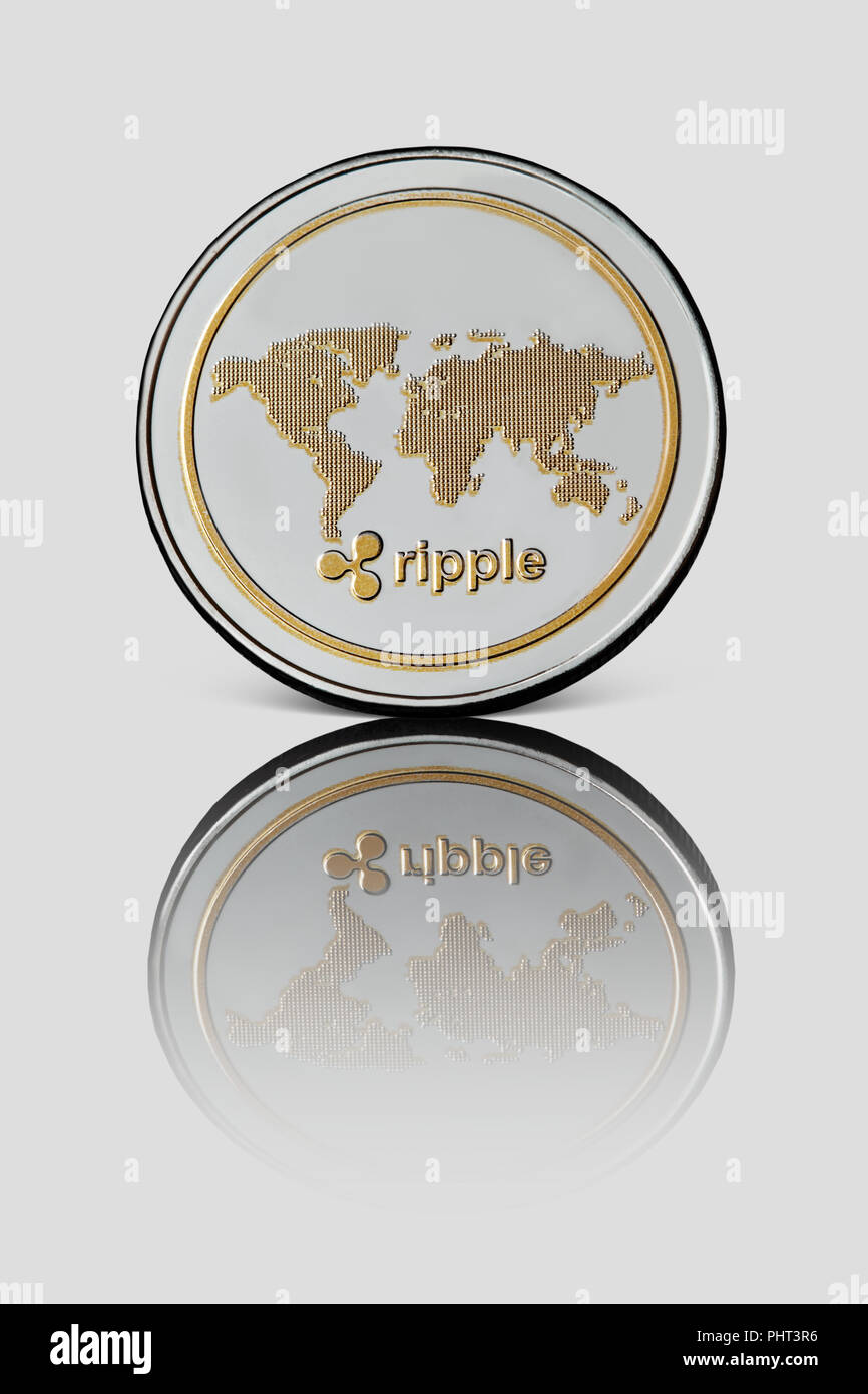 Coin ripple on white glossy background. Business concept Stock Photo ...