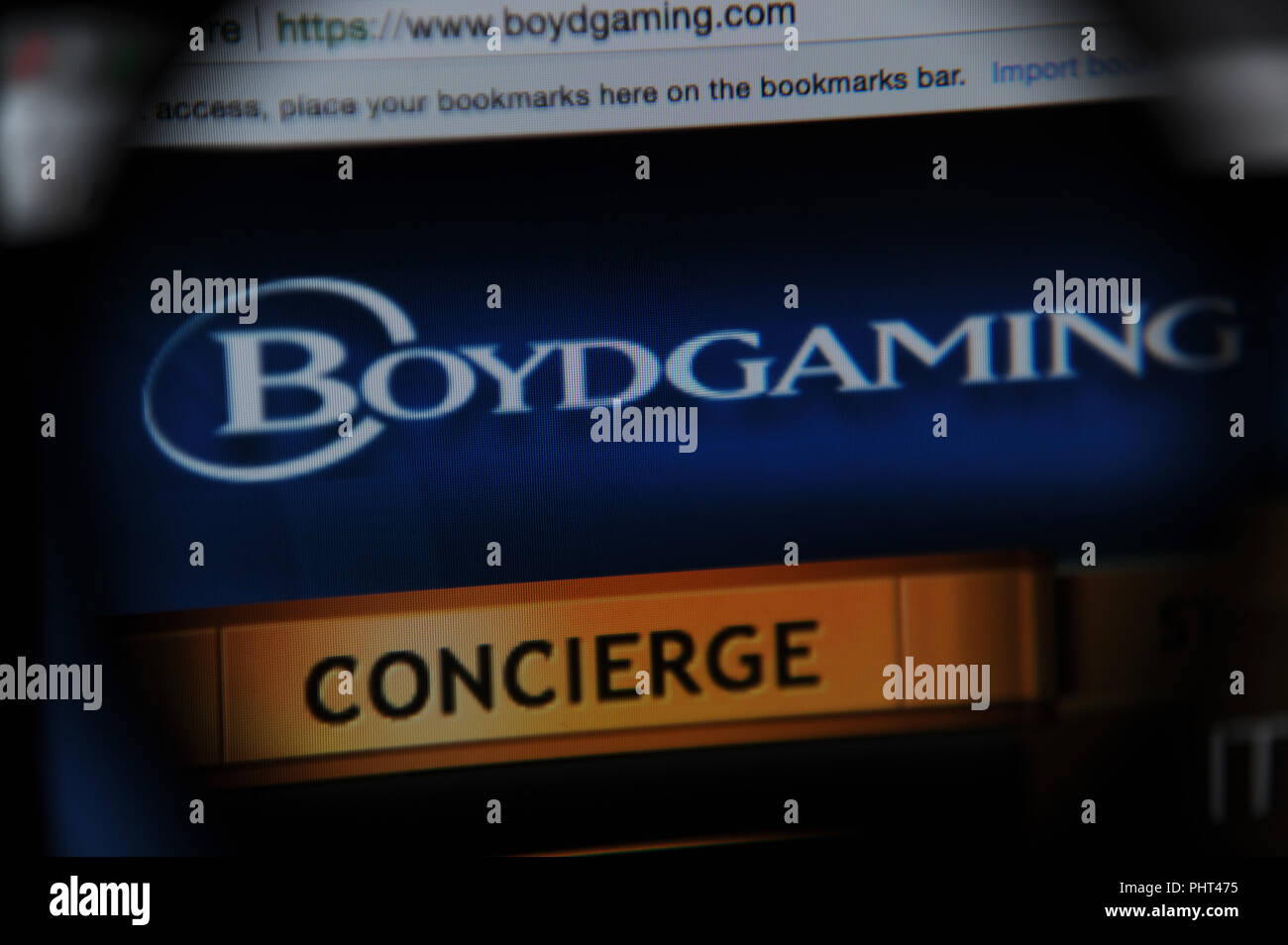 Boyd Gaming website seen through a magnifying glass Stock Photo - Alamy