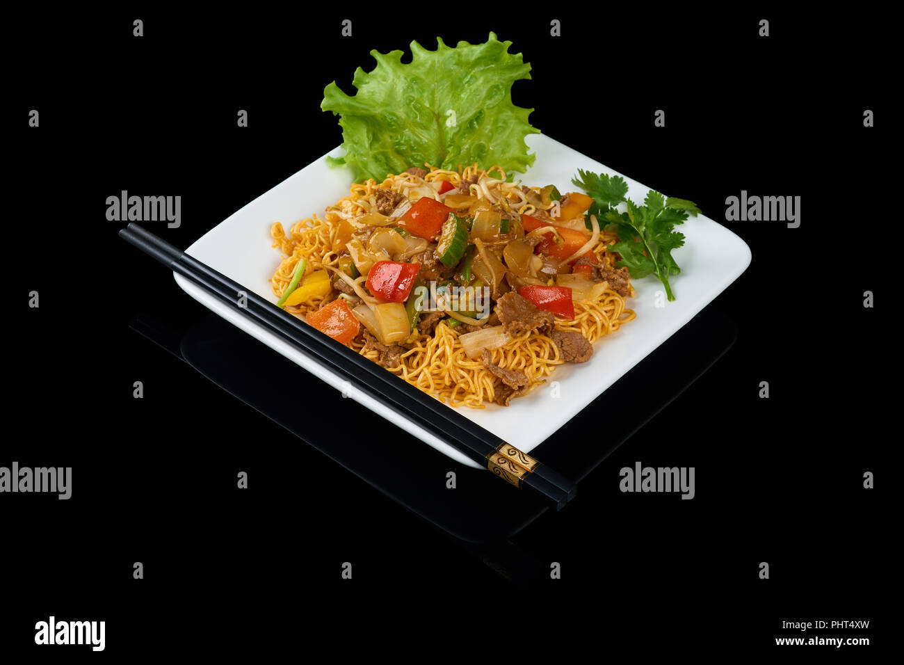 Mi Xao stir-fried noodles asian meals on triangle plate isolated on ...