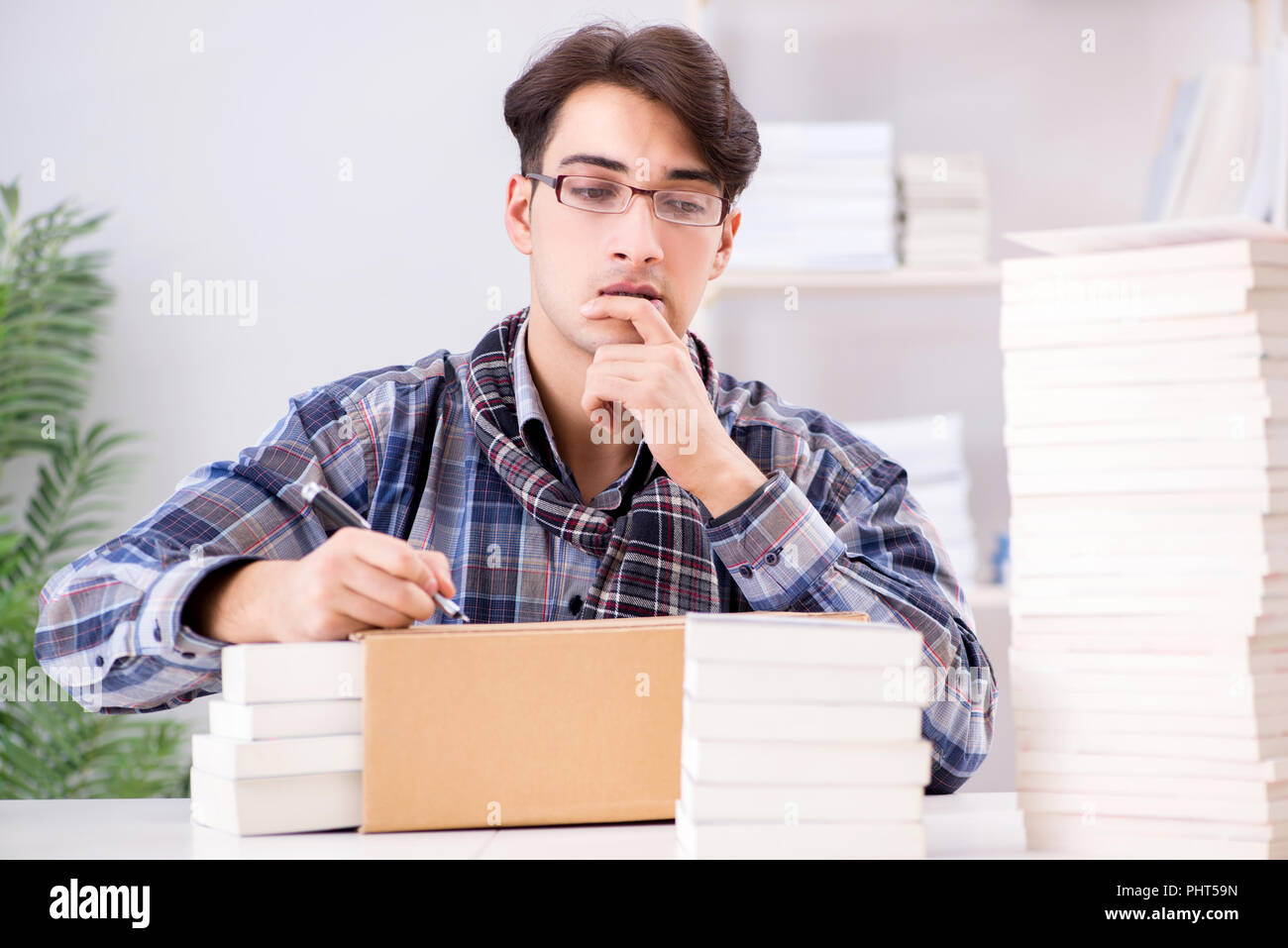 Writer presenting his books to public Stock Photo - Alamy