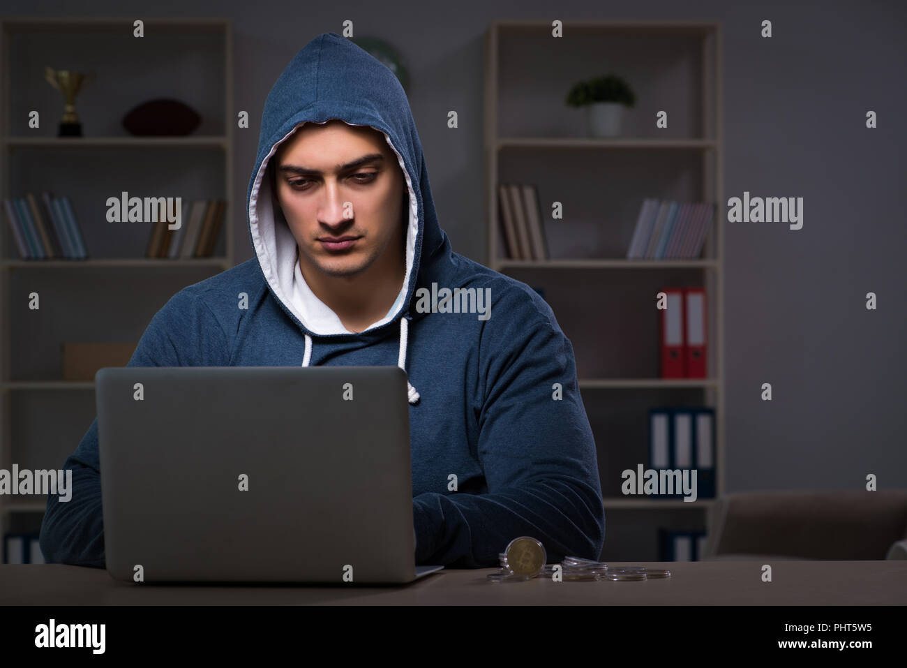 Hacker hacking the data late at night Stock Photo - Alamy