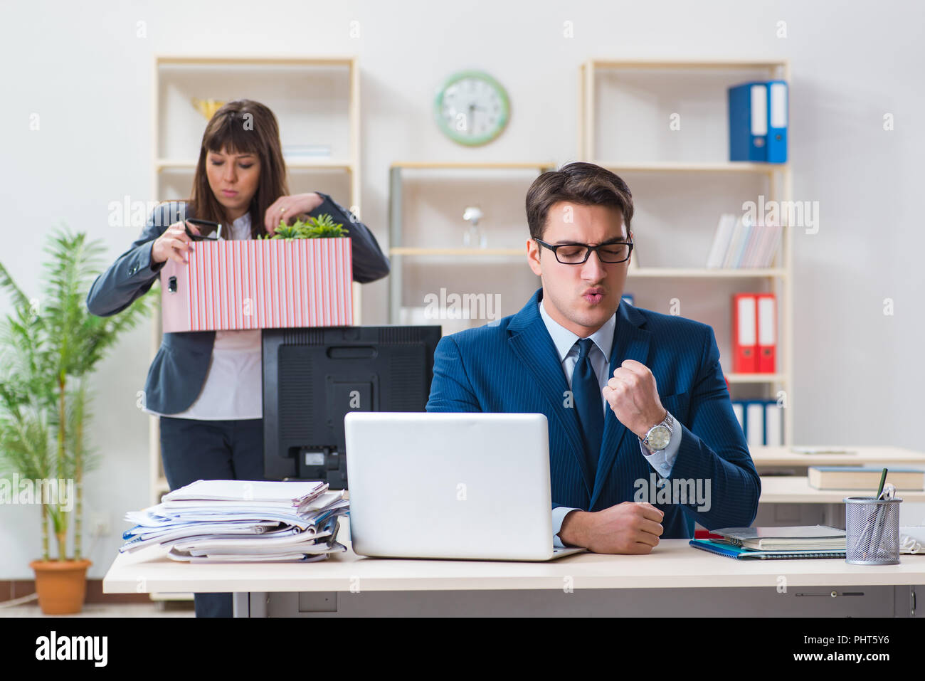 Person being fired from his work Stock Photo - Alamy