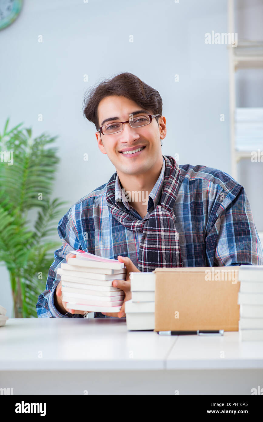 Writer presenting his books to public Stock Photo - Alamy
