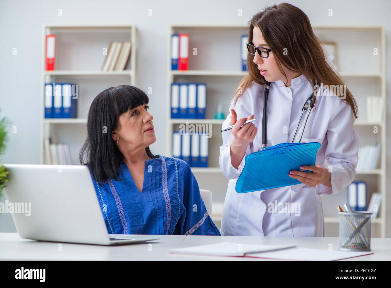 Doctor discussing test results senior hi-res stock photography and ...