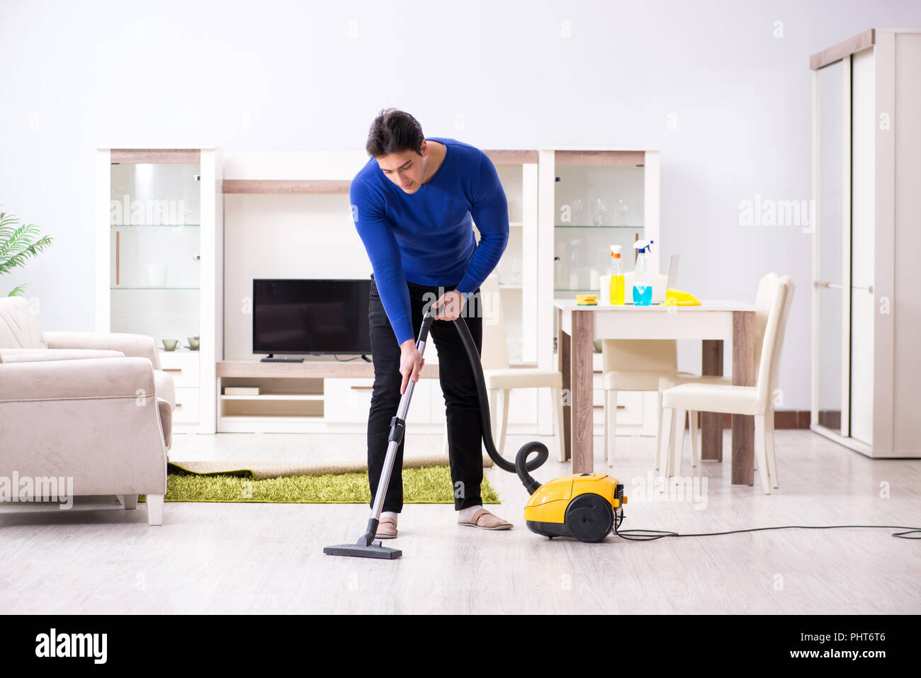 Houseman housekeeping cleaning vacuum cleaner hi-res stock photography ...