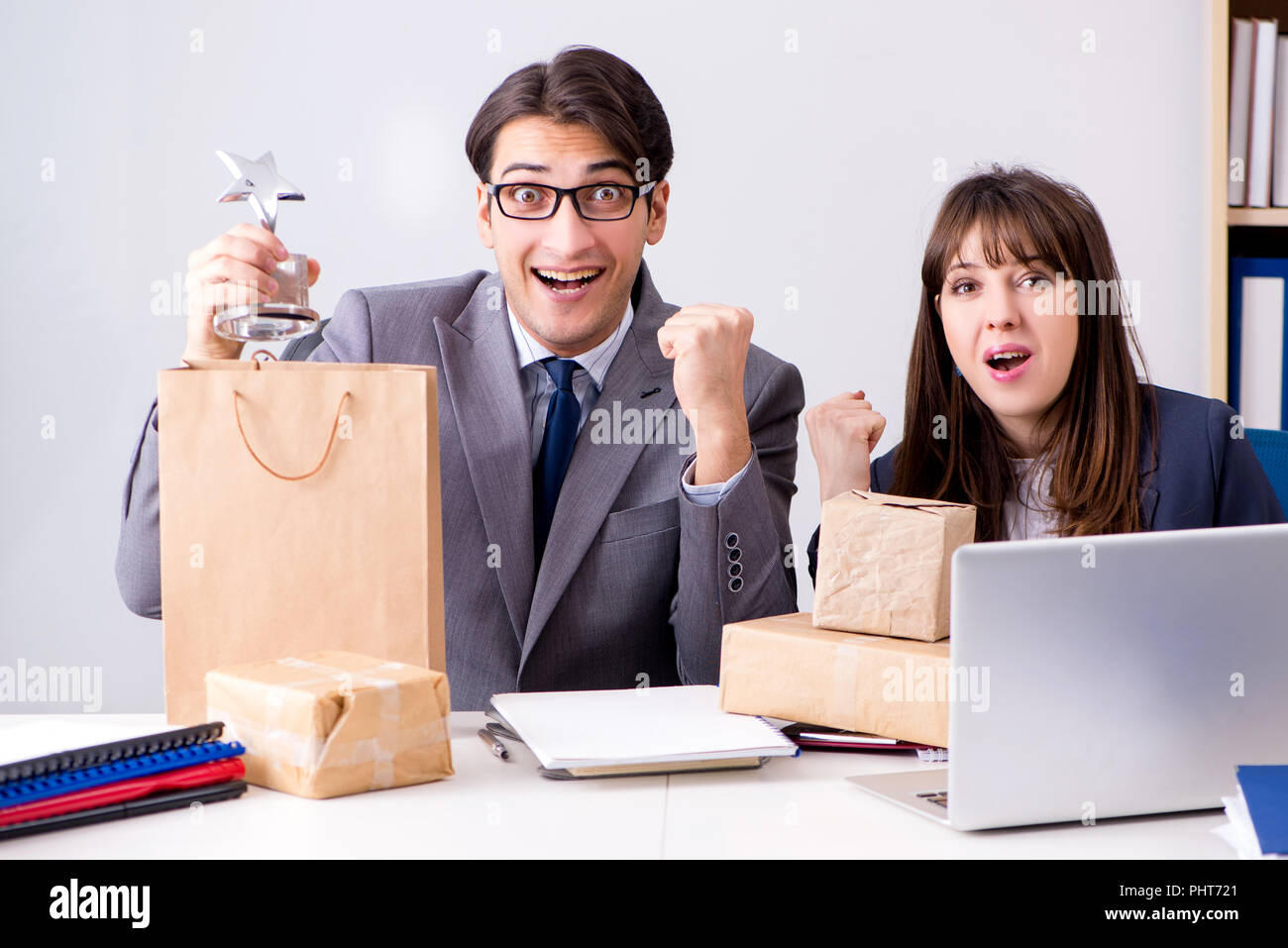 Business people receiving new mail and parcels Stock Photo - Alamy
