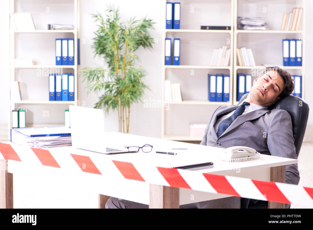 Dead businessman at this desk Stock Photo - Alamy