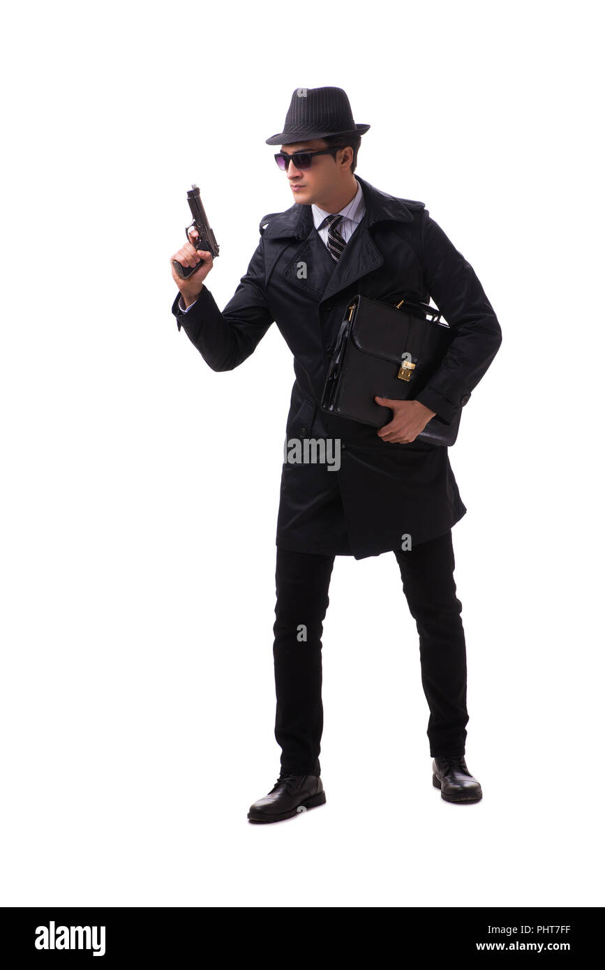 Man spy with handgun isolated on white background Stock Photo - Alamy