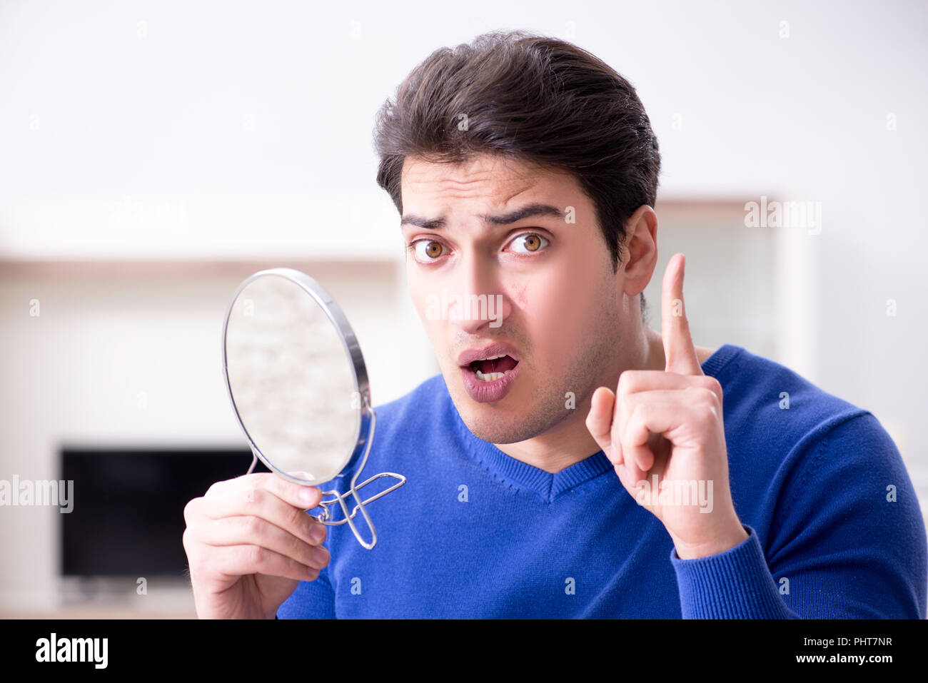 Man panicking because of pimples on the skin Stock Photo - Alamy