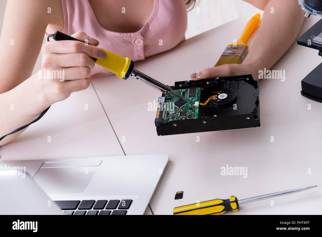 Hard drive repair and data recovery with restoration Stock Photo - Alamy