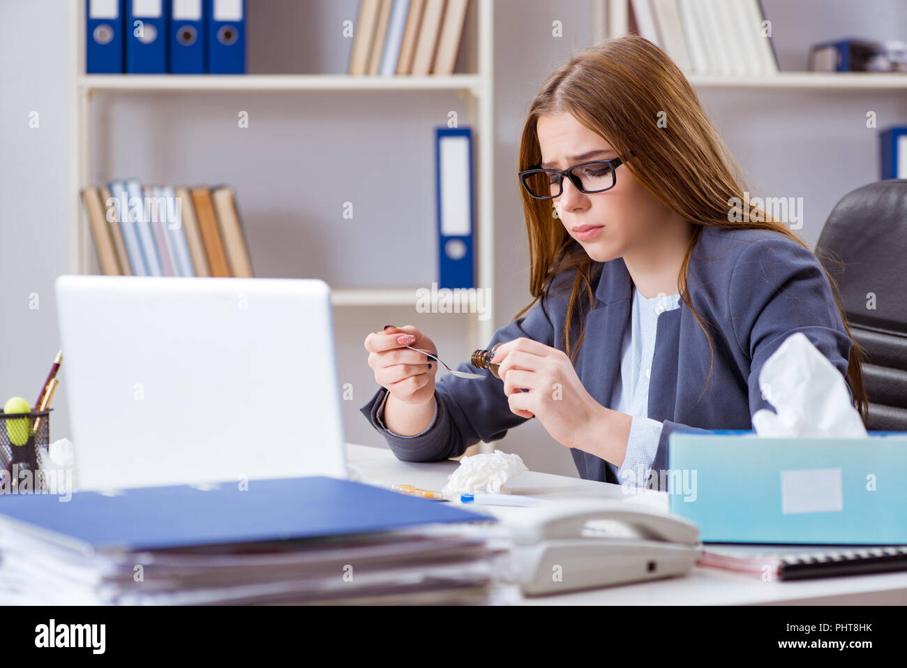 Businesswoman employee sick in the office Stock Photo - Alamy