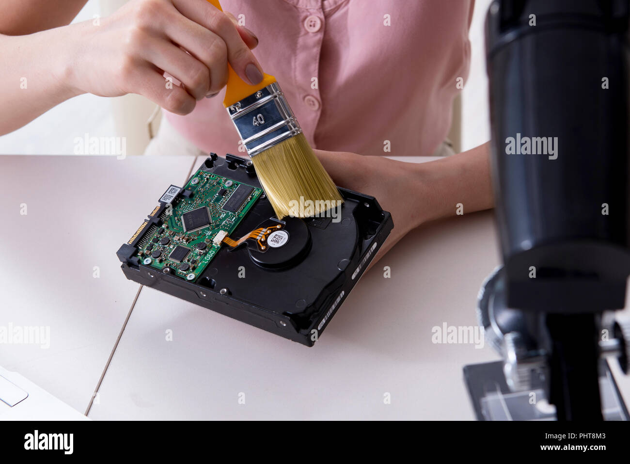 Hard drive repair and data recovery with restoration Stock Photo - Alamy
