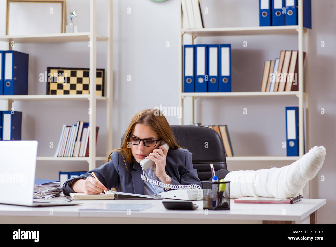 Businesswoman with broken foot hi-res stock photography and images - Alamy