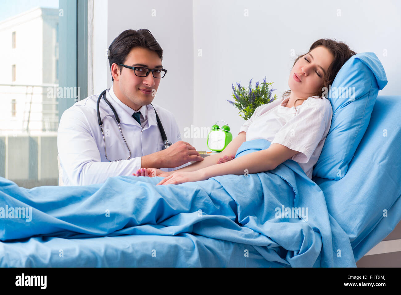 Doctor doing medical injection in hospital room Stock Photo - Alamy