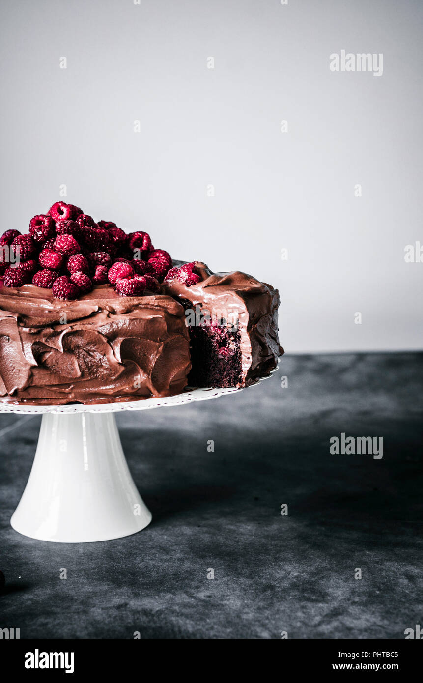 Chocolate raspberry cake with coconut milk chocolate ganache Stock ...
