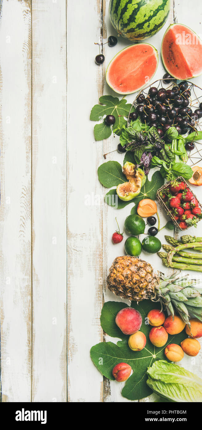 Summer food background. Flat-lay of seasonal fruit, vegetables and ...