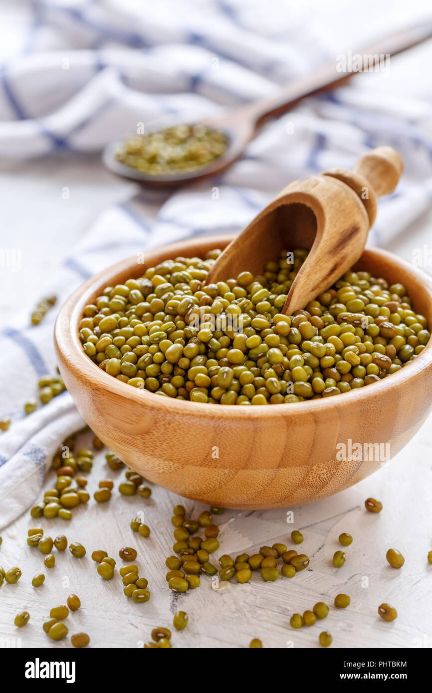 Organic mung beans in wooden bowl Stock Photo - Alamy