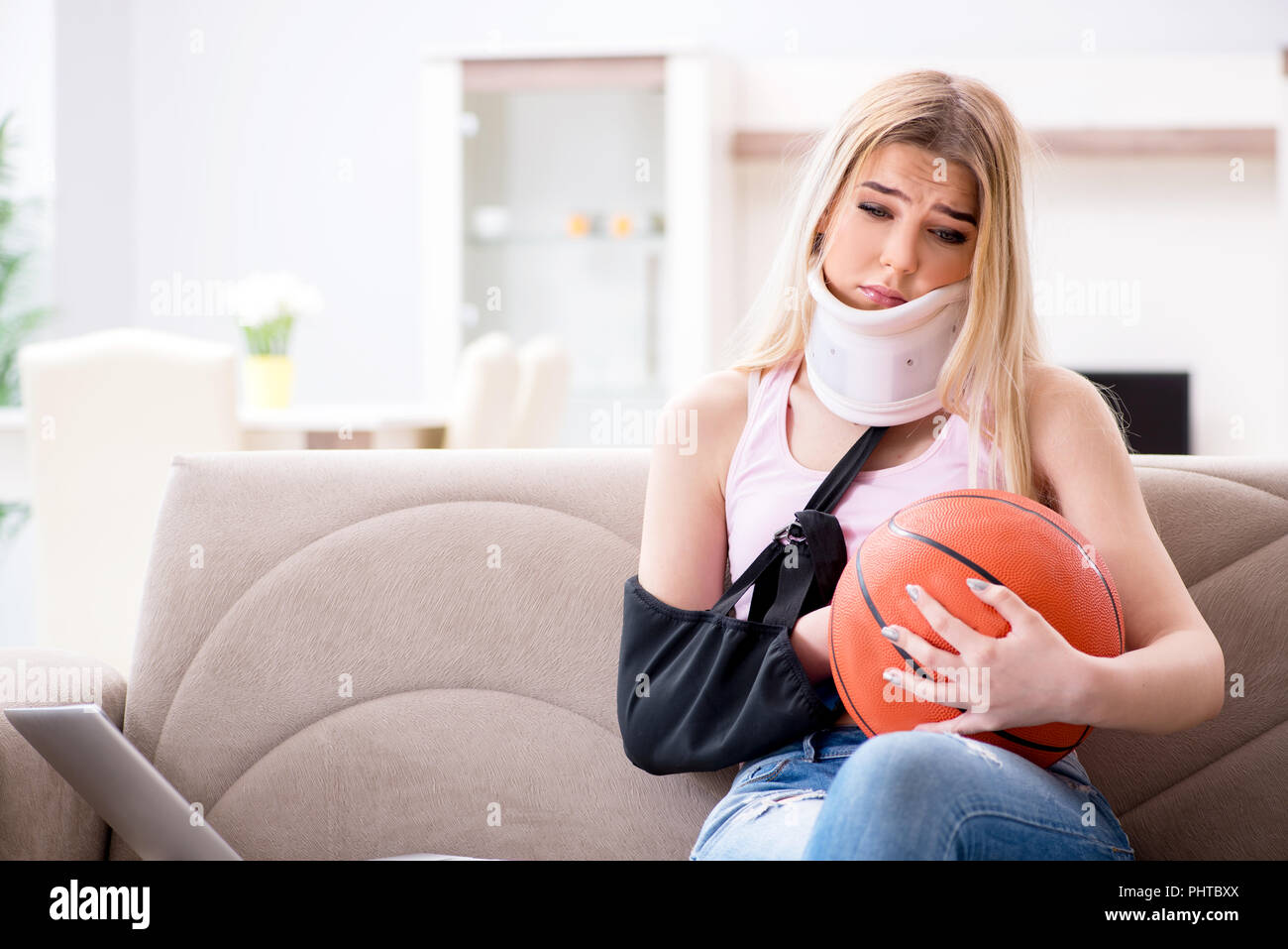 Woman injured during sport game Stock Photo - Alamy
