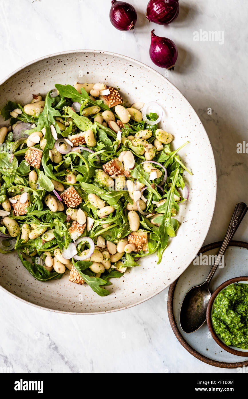 White Bean and Arugula Salad Stock Photo - Alamy